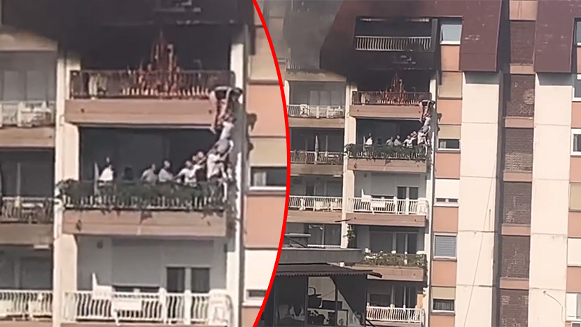 Dramatic action to rescue girl from a Belgrade fire: Workers lowered ...